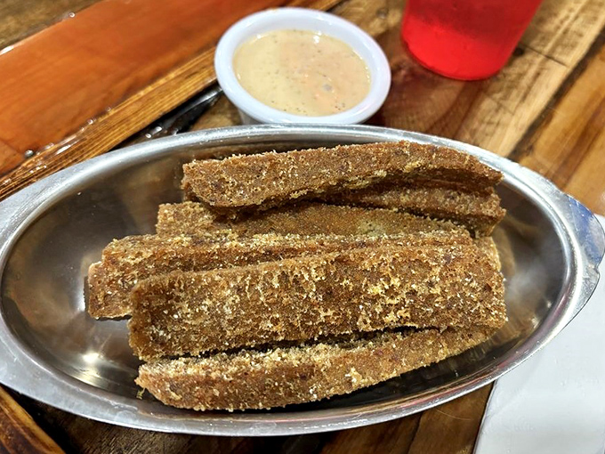 Golden-brown scrapple sticks – Pennsylvania's contribution to breakfast civilization – crispy outside, tender inside, and worth every adventurous bite.