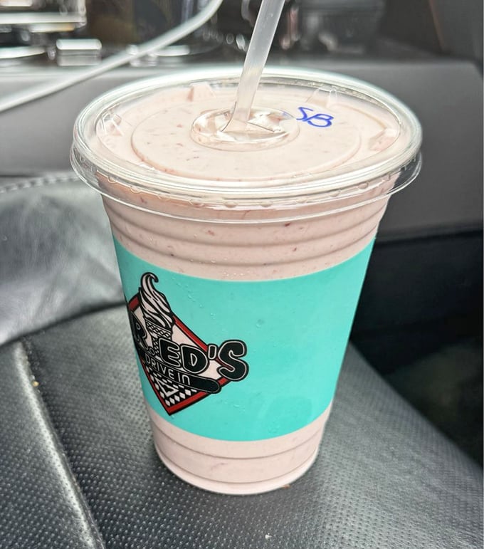 This strawberry shake isn't just thick – it's the kind that makes your straw stand at attention while your taste buds do a happy dance.