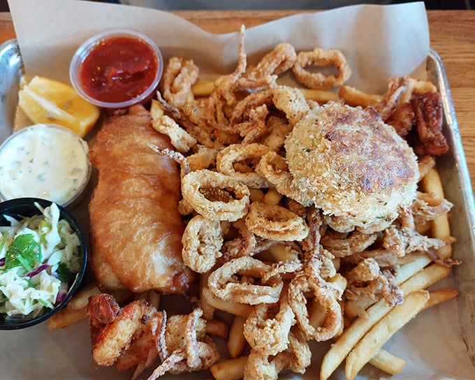 The seafood platter that launched a thousand return visits. Golden-fried perfection with three dipping sauces—because life's too short for condiment monogamy.