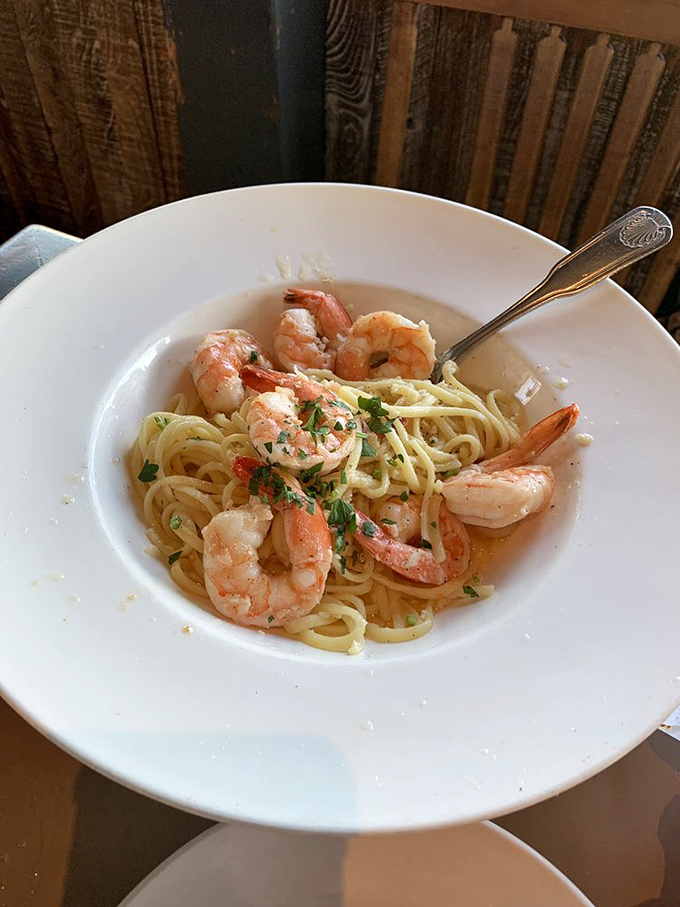 These plump shrimp lounging on a bed of pasta aren't just scampi – they're a masterclass in garlic-butter simplicity.