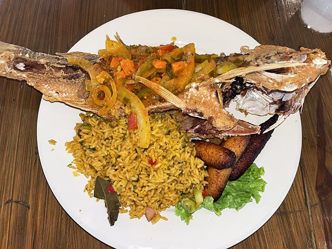 This isn't just dinner; it's Florida on a plate—whole snapper with sweet plantains that would make your abuela proud (even if she's from Milwaukee).