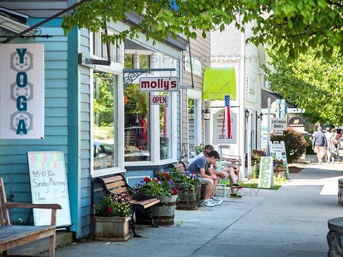 Small-town shops where the phrase "just browsing" becomes an afternoon adventure. These colorful storefronts house treasures that big-box retailers can't replicate.