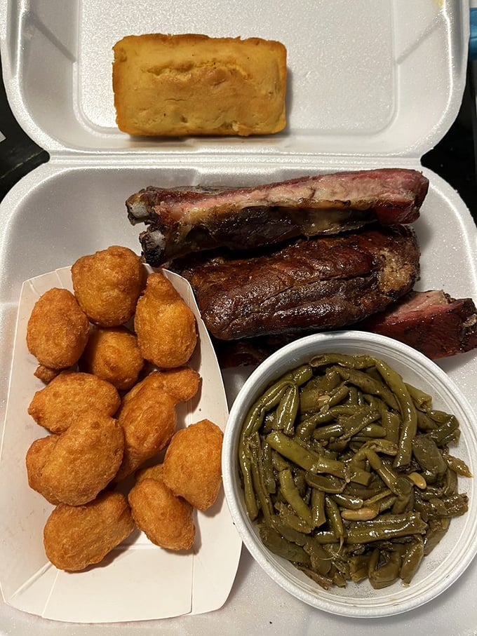 St. Louis ribs with the perfect smoke ring, cornbread standing at attention, and sides that refuse to be upstaged. This is barbecue's greatest hits album.
