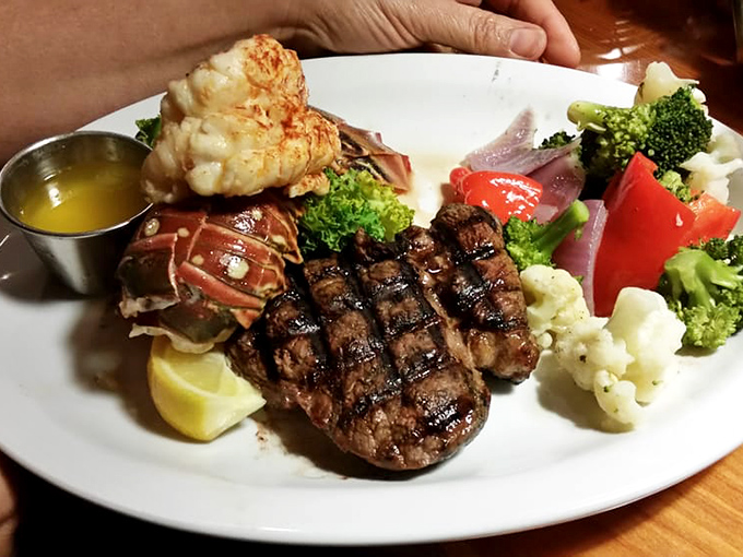 Steak and lobster—surf meets turf in perfect harmony, like Sinatra and Martin sharing a stage, each star getting its moment to shine.