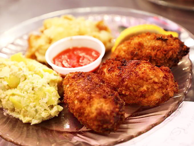 Golden-fried treasures that make you wonder why anyone bothers with fancy seafood towers when perfection comes on a paper plate.