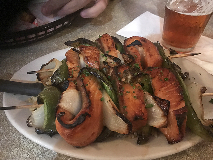 Teriyaki salmon skewers that could make a pescatarian weep with joy. The char marks aren't just decoration—they're flavor's autograph on each piece.