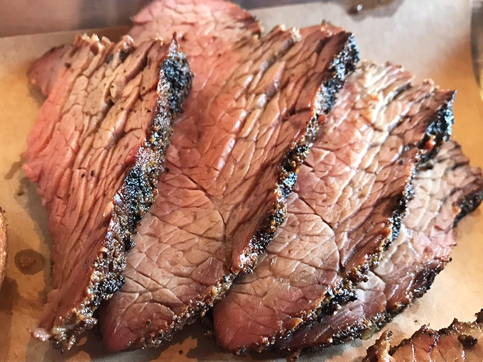 This tri-tip isn't just cooked, it's been given a PhD in deliciousness – notice that perfect pink center surrounded by that heavenly bark.