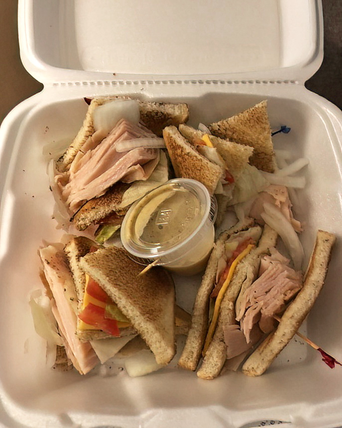 Behold the Turkey Club in all its glory—layers of real turkey, not that processed stuff that tastes like it was made in a laboratory.