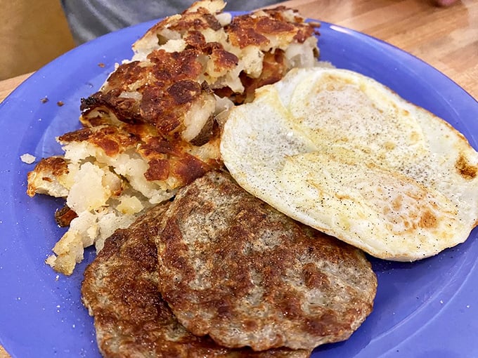 The star of the show: turkey sausage patties with the perfect sear, alongside potatoes that didn't just fall off the truck—they were loved into crispness.