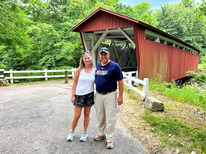 Visitors find the bridge makes for the perfect backdrop—a crimson counterpoint to summer greenery and blue skies.