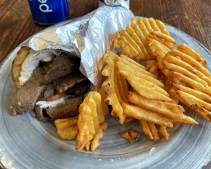 These aren't your average fries—they're waffle-cut companions to gyro perfection. Crispy, golden, and ready to soak up every last drop of tzatziki.