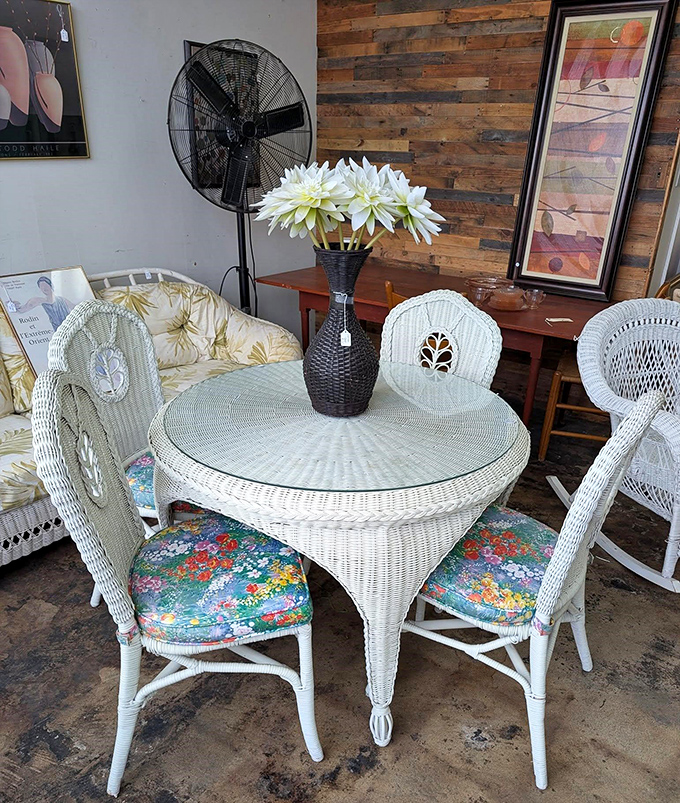 This wicker dining set isn't just furniture; it's a summer afternoon waiting to happen, complete with floral cushions that scream "serve me lemonade!"