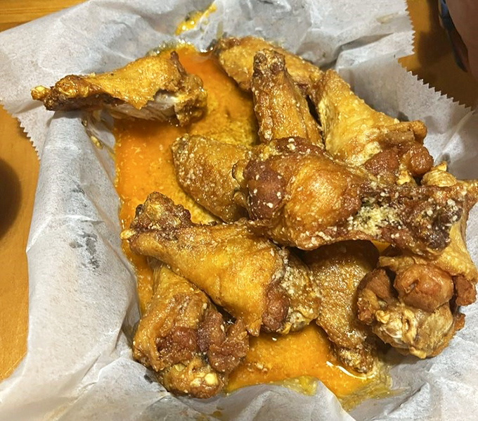 These wings aren't just golden-brown perfection—they're the kind of crispy, saucy masterpieces that ruin all other wings for you forever.