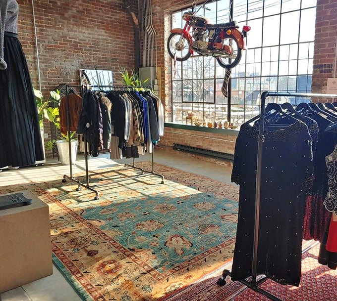 Who says vintage can't make a statement? That suspended motorcycle proves even transportation can become transformative décor.