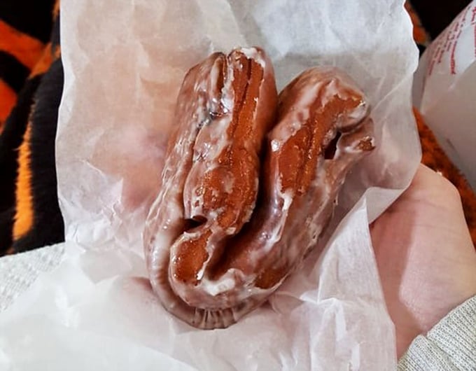 This apple fritter isn't just a pastry – it's a crispy, glazed monument to what happens when apples meet dough in pastry paradise.