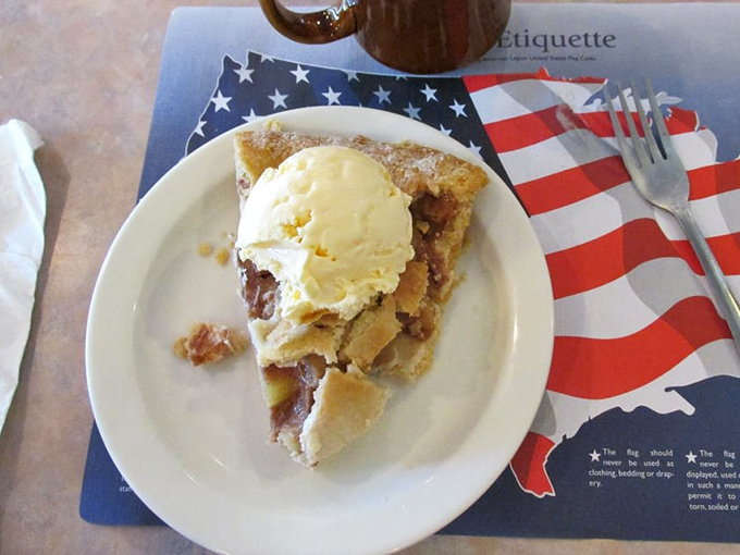 Apple pie à la mode served on an American flag placemat—Norman Rockwell couldn't paint a more perfect slice of Americana if he tried.