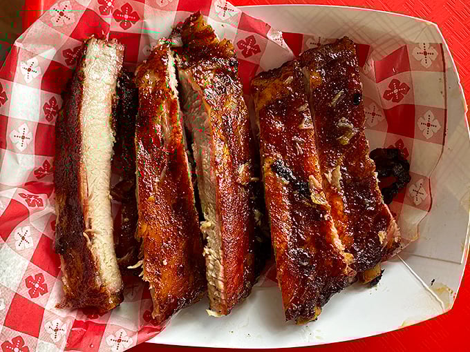 These ribs don't just fall off the bone—they practically leap into your mouth with a smoky, caramelized exterior that's worth the drive.