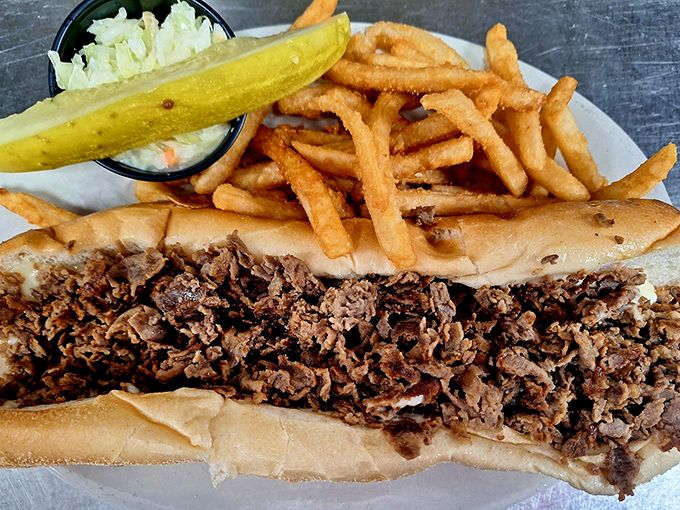 This Philly cheesesteak sandwich isn't just a meal—it's a Pennsylvania handshake. Those golden fries are the perfect supporting cast.