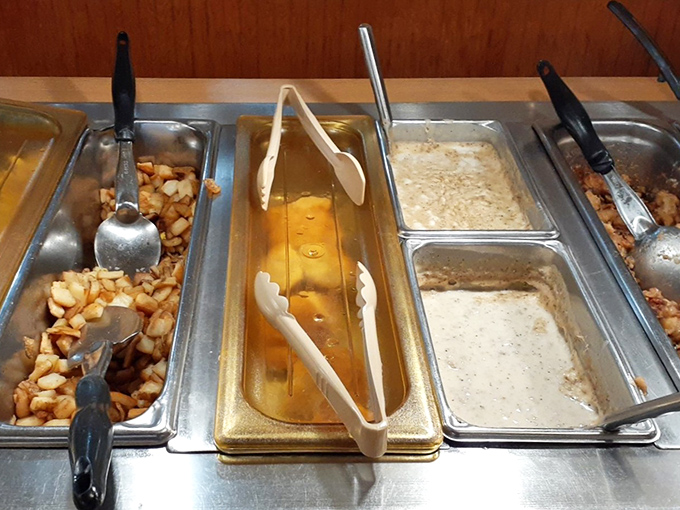 Breakfast buffet stations gleaming with promise—where decisions are tough and second helpings are practically mandatory.
