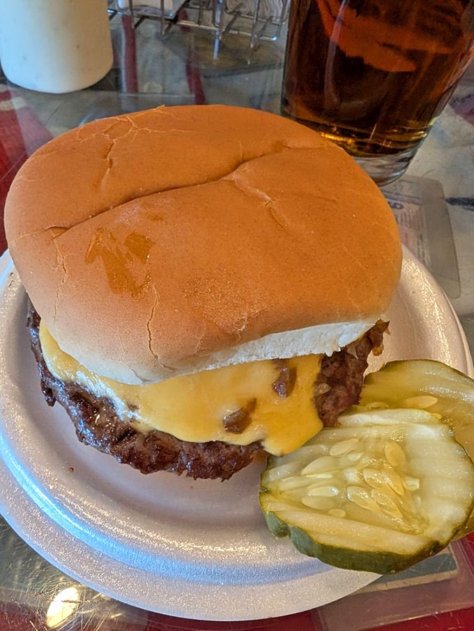 The legendary Brick Burger in all its glory – a perfectly seared patty with melted cheese that makes you question why you'd eat burgers anywhere else.