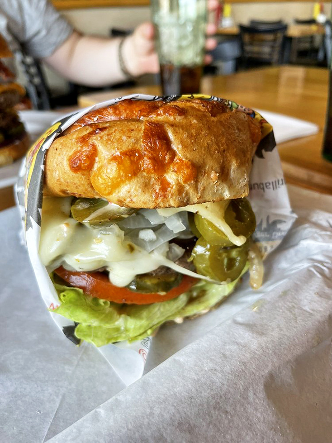 Behold, the architecture of joy! Layers of fresh ingredients stacked with mathematical precision, yet there's nothing calculated about the pleasure it delivers.