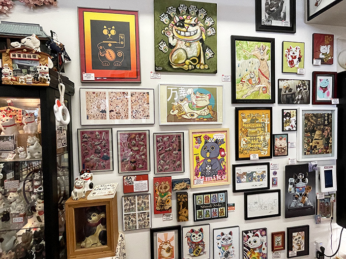 Wall-to-wall whiskers! This artistic corner features creative interpretations of lucky cats, proving these fortune-bringing felines have inspired artists worldwide.