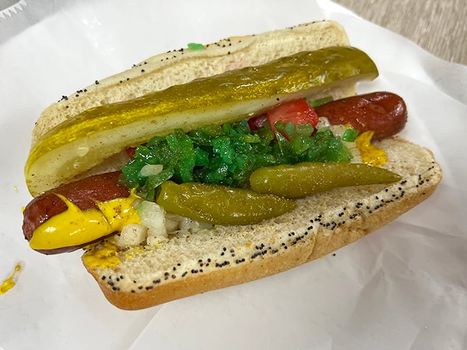 Behold the chili dog masterpiece – where homemade chili meets perfectly grilled frankfurter in beautiful harmony.