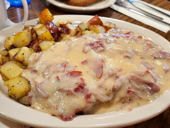 Cream chipped beef in all its glory—tender dried beef swimming in velvety sauce, proving that sometimes the most humble dishes deliver the most satisfaction.
