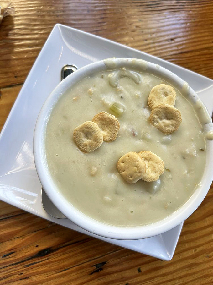 Clam chowder so creamy and comforting it could end family feuds. Those oyster crackers aren't just garnish—they're little lifeboats of crunch.