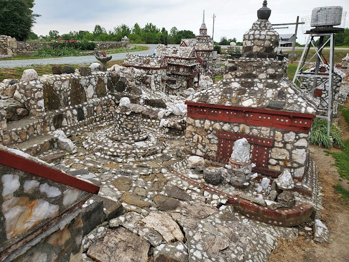 Stone upon stone, a miniature world unfolds. The intricate stonework creates a fascinating tapestry of textures that begs for a closer look.