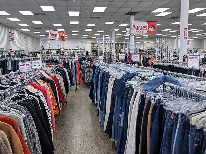 Organization meets treasure hunt in the men's section, where color-coded racks create a rainbow road to style reinvention.