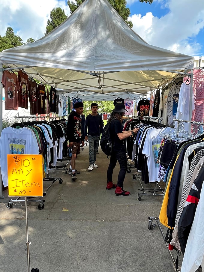 Any item $10 reads the sign in this clothing vendor's tent, where fashion archaeologists dig through racks for that perfect band tee or vintage jacket.