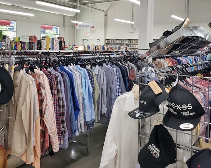Men's shirts lined up like soldiers ready for inspection. That perfect Oxford button-down is hiding here somewhere, just waiting to upgrade your Zoom meeting game.