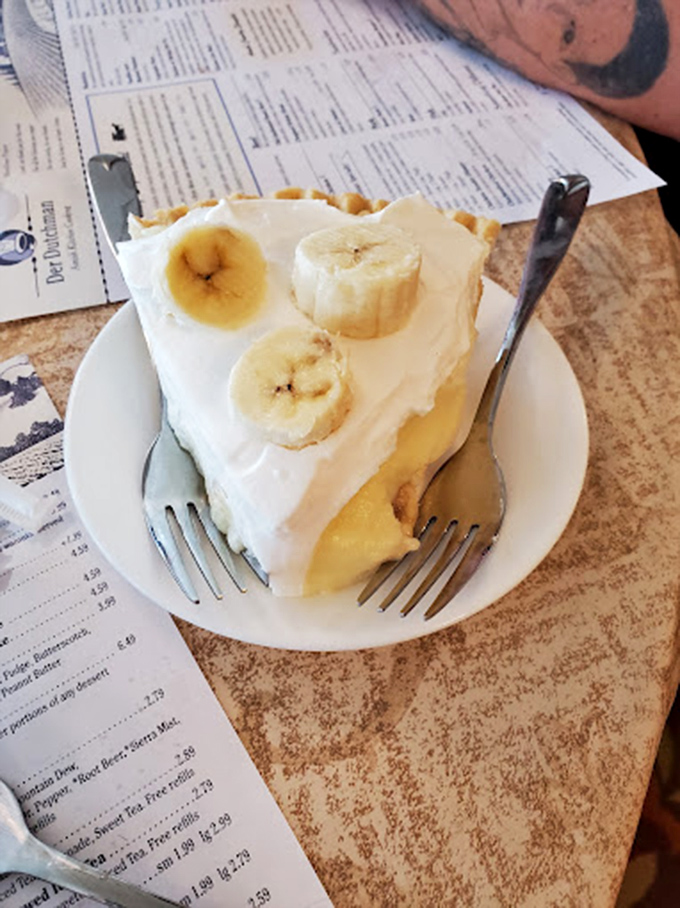 This banana cream pie doesn't just satisfy a sweet tooth—it creates a lifelong commitment. Resistance is futile.