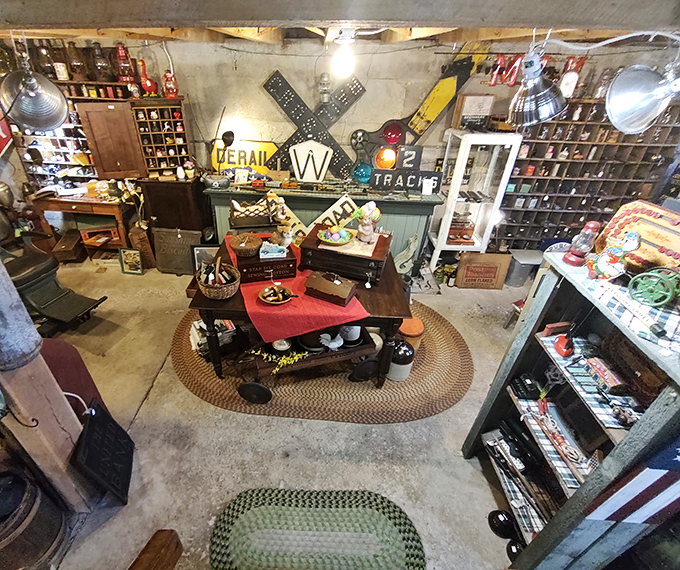Railroad memorabilia meets vintage signage in this treasure trove corner. That windmill piece would transform a boring wall into a conversation starter!