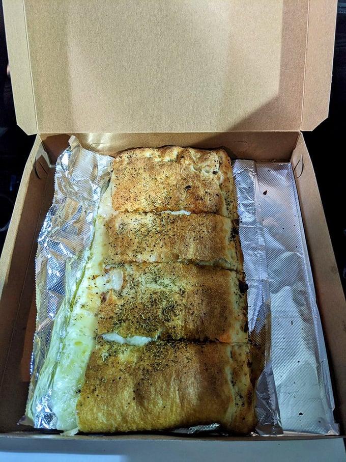 The legendary double-crust white pizza—a cheese-filled revelation that makes you question everything you thought you knew about pizza. Old Forge style isn't just different, it's transcendent.