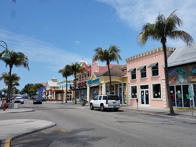 Fort Myers Beach's colorful storefronts create a pastel paradise that feels like someone spilled a rainbow into their architectural plans—delightfully so.