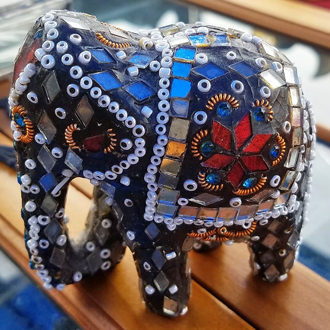 This bejeweled elephant figurine isn't just decoration – it's a tiny ambassador of artistry that transforms any shelf into an exotic destination.