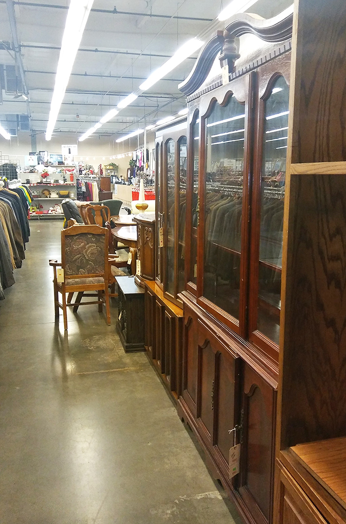 Stately wooden cabinets and vintage chairs huddle together like old friends at a reunion, whispering stories of dinner parties past.