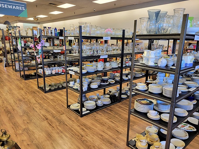 Dishware heaven! One person's castoff china is another's dinner party conversation starter. Martha Stewart would approve of these organized shelves.