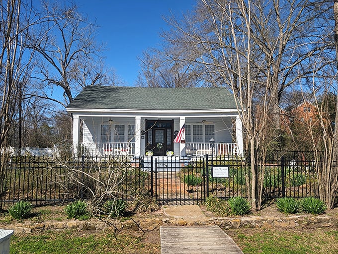 This quaint historic cottage represents Jefferson's architectural soul – white clapboard, welcoming porch, and a hint that ghost stories might come complimentary.