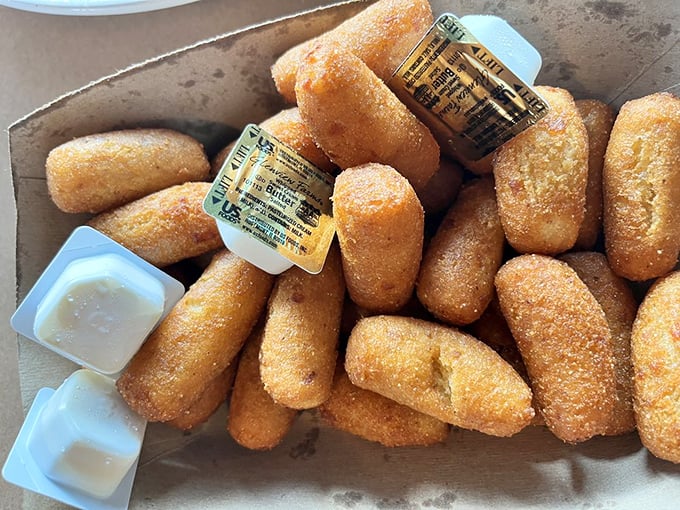 Golden pillows of cornmeal perfection! These hush puppies aren't just side dishes—they're the supporting actors that sometimes steal the whole show.