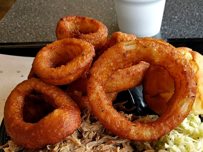 Golden halos of perfection. These aren't just onion rings—they're crispy, savory crowns that make you question every other onion ring you've ever encountered.