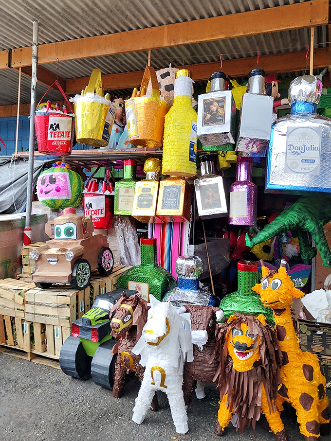 Piñatas hang in festive suspension, each character silently promising a celebration filled with candy, laughter, and the sweet chaos of tradition.