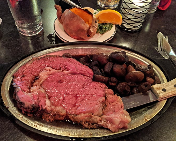 Behold the star of the show: prime rib so perfectly roasted it practically poses for its portrait, accompanied by mushrooms that have found their purpose in life.