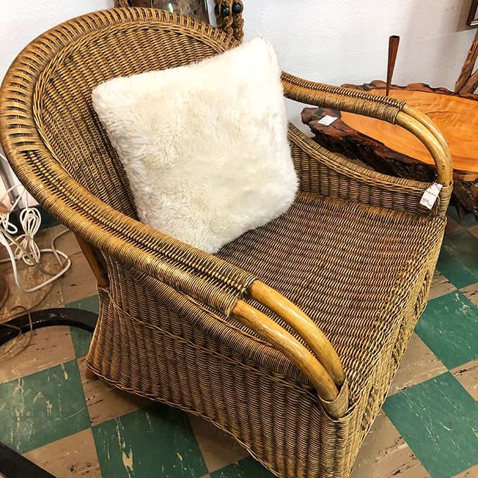 This rattan chair isn't just furniture—it's a time machine to 1970s sunrooms where cocktails were served with paper umbrellas and conversation flowed freely.