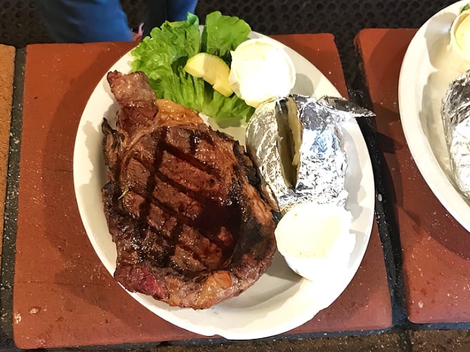 This isn't just a steak—it's a masterpiece of meat. The perfect grill marks tell you everything you need to know about the kitchen's priorities.