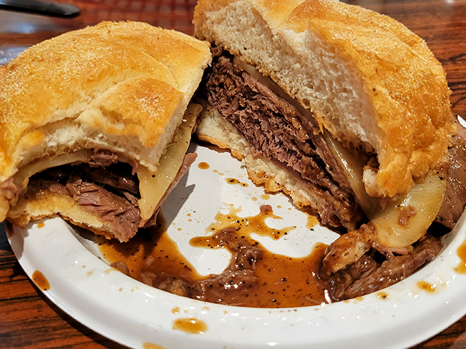 The legendary roast beef sandwich in all its glory—tender meat swimming in savory jus, nestled in a roll that's achieved bread perfection.