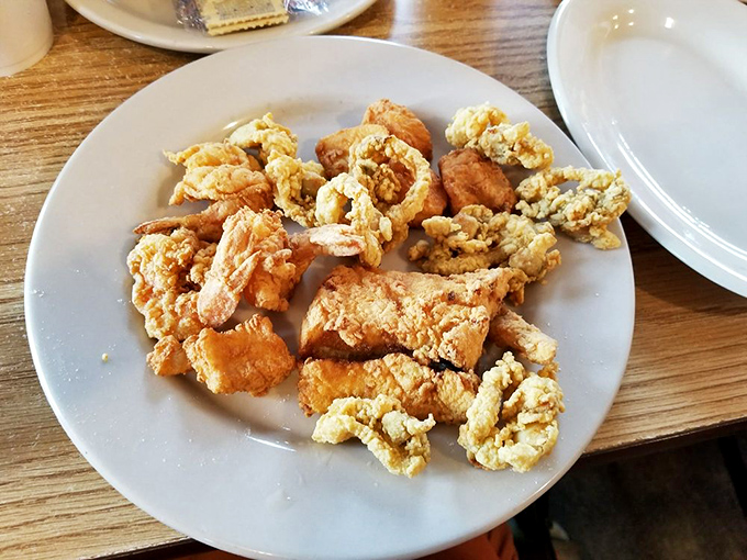 Golden-fried seafood that doesn't hide behind fancy plating – just honest-to-goodness crunch giving way to tender treasures from the deep.