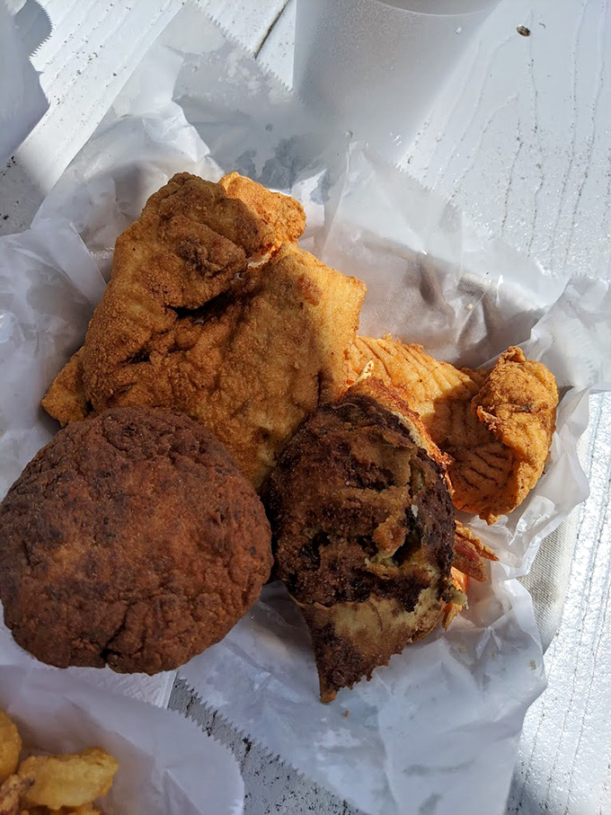 Golden fried perfection that makes you wonder why anyone bothers cooking seafood any other complicated way.
